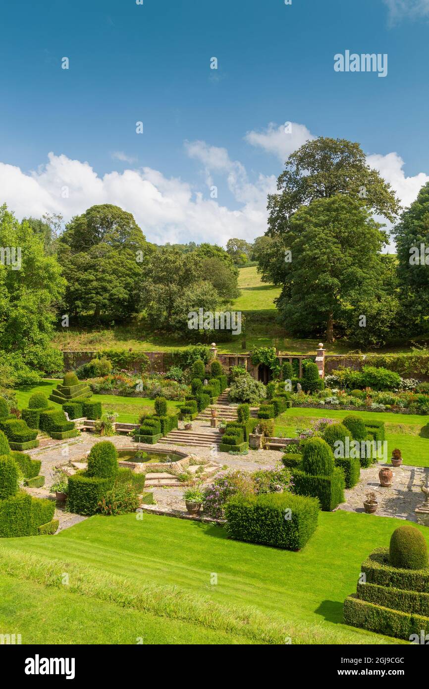 The colourful borders and topiary in the italianate Fountain Court ...