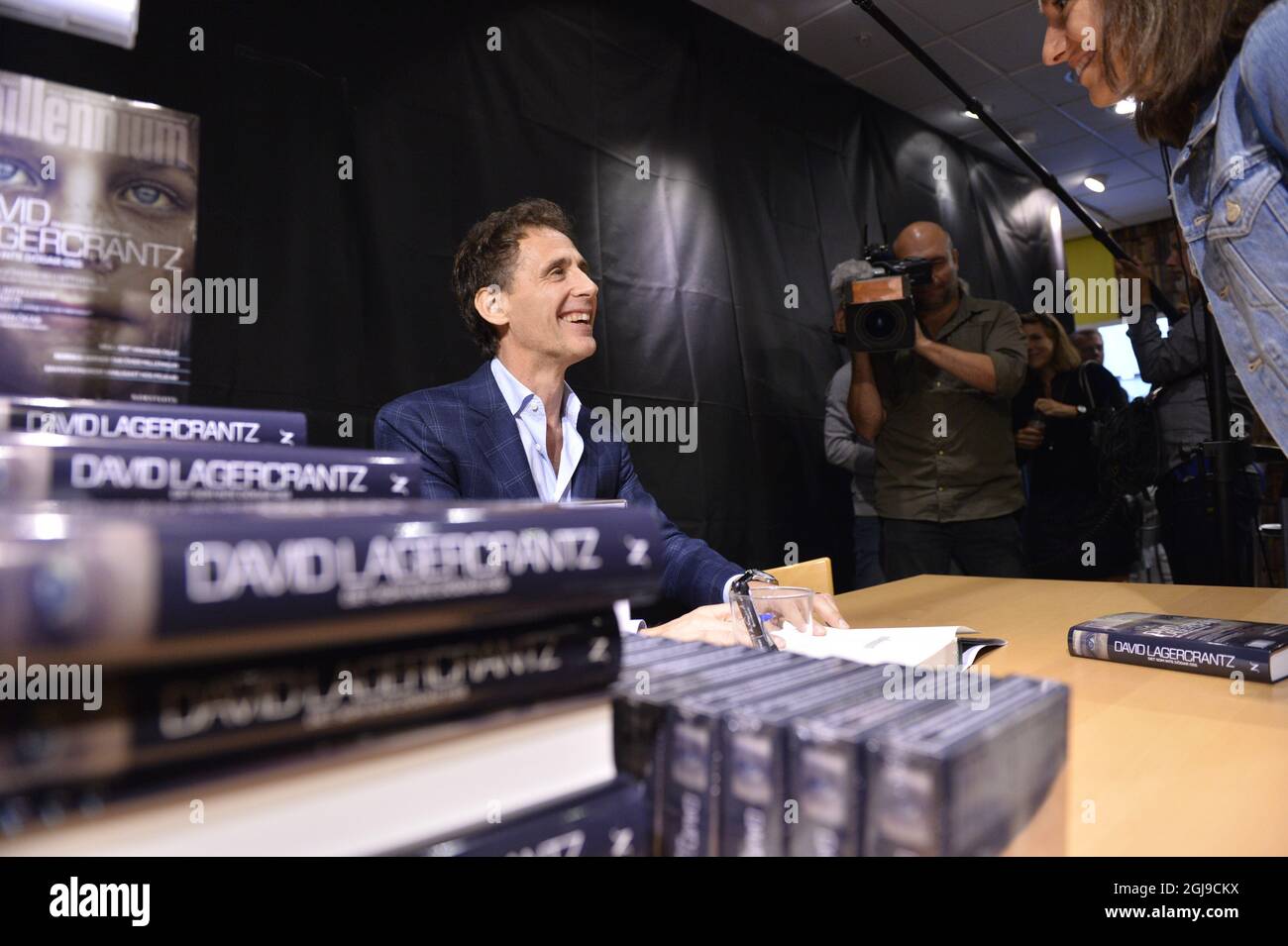 STOCKHOLM 20150827 Swedish writer David Lagercrantz is seen signing ...