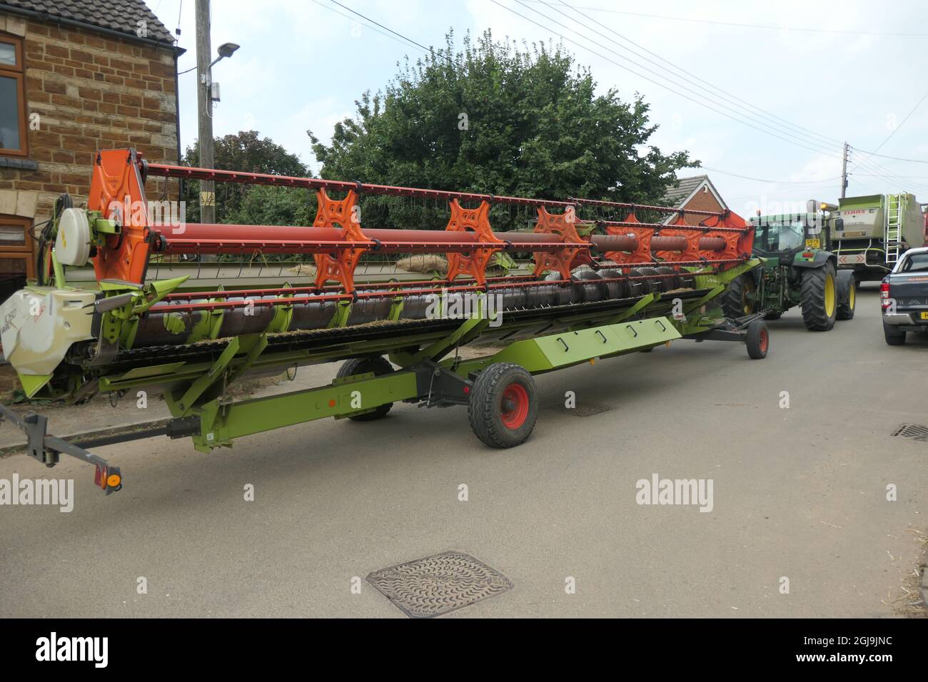 Moving farm machinery in Ringstead Northamptonshire Village UK Stock ...