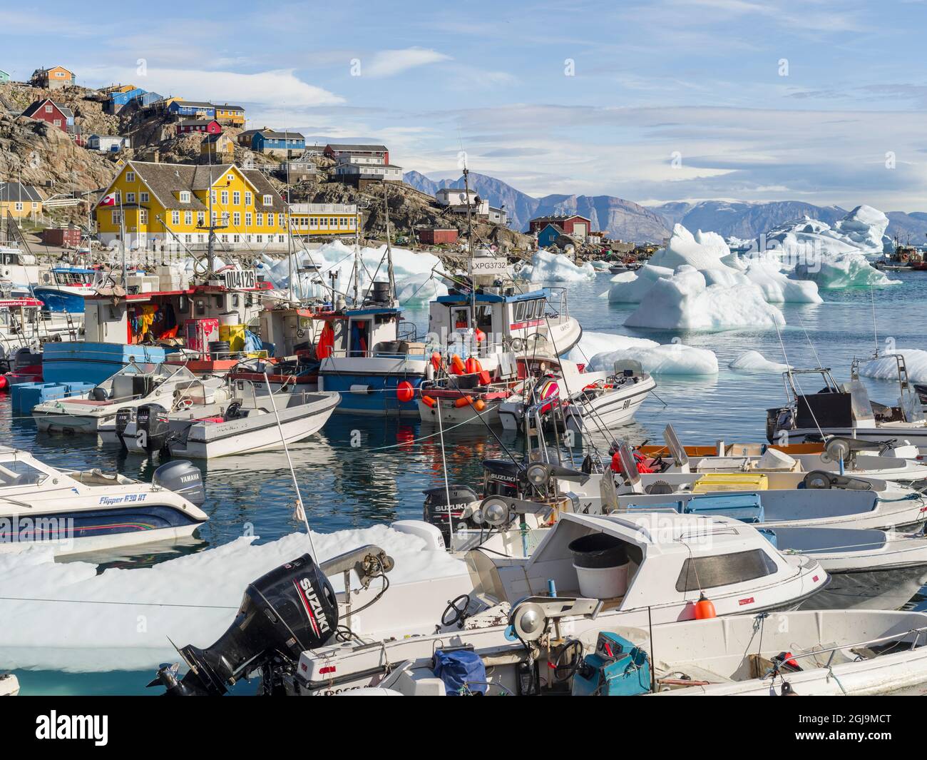 Uummannaq harbor and town, northwest of Greenland, located on an island ...