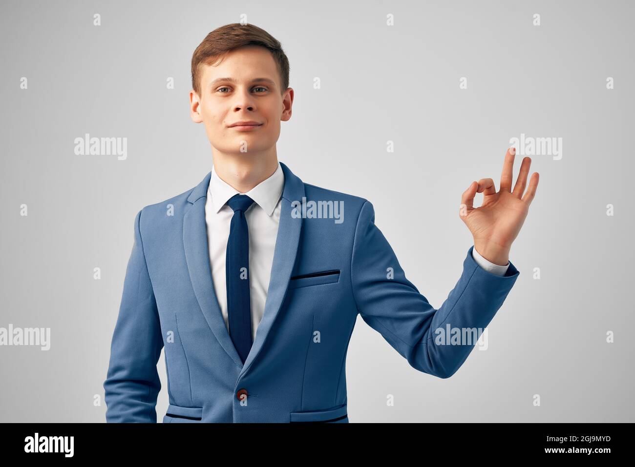 Cheerful business man in suit official office work posing Stock Photo ...