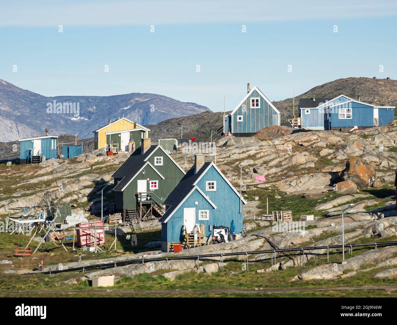 Small fishing village on Ikerasak island in the Uummannaq Fjord System ...
