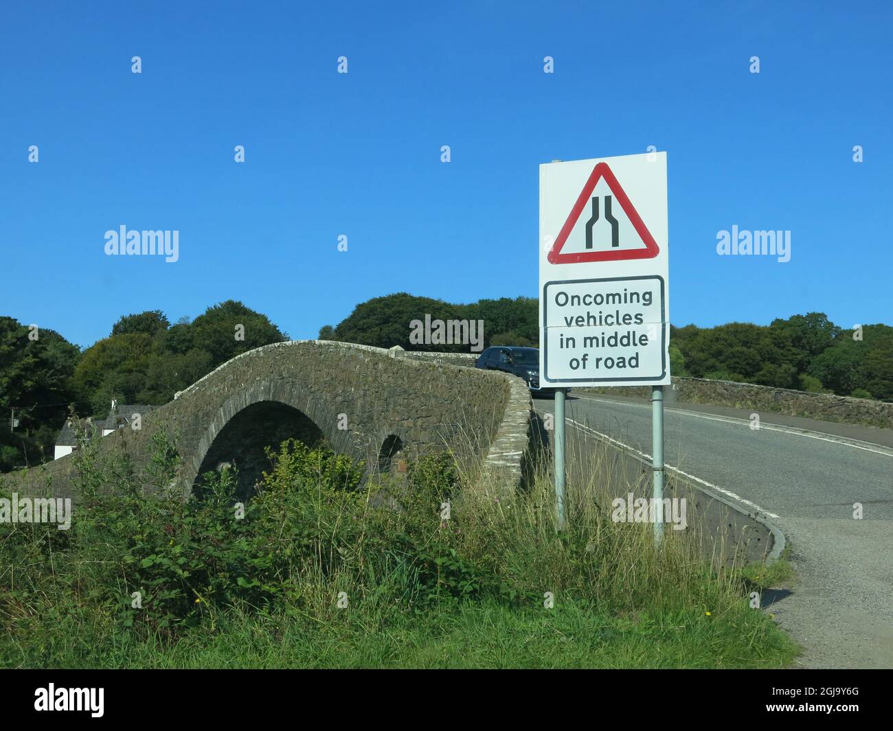 The single-arched, hump-backed Clachan Bridge is known as "The Bridge ...