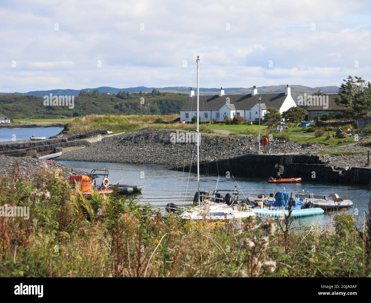 A typical Scottish scene in the Highlands & Islands of white-washed ...