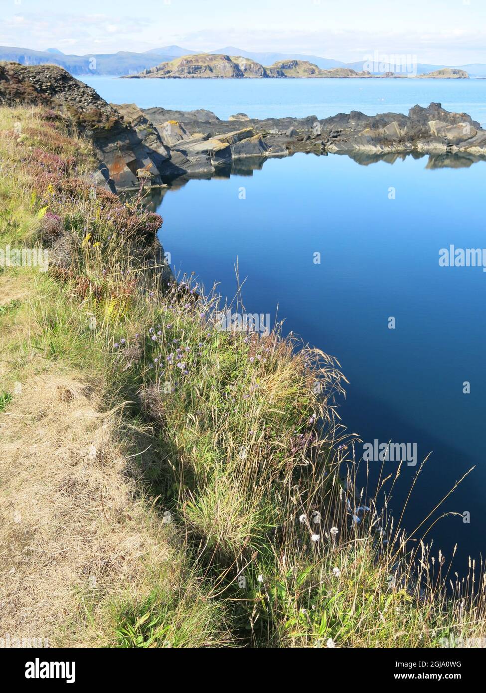 Deep rock pools & clear blue water: the Slate Islands in western ... Deep rock pools & clear blue water: the Slate Islands in western ...