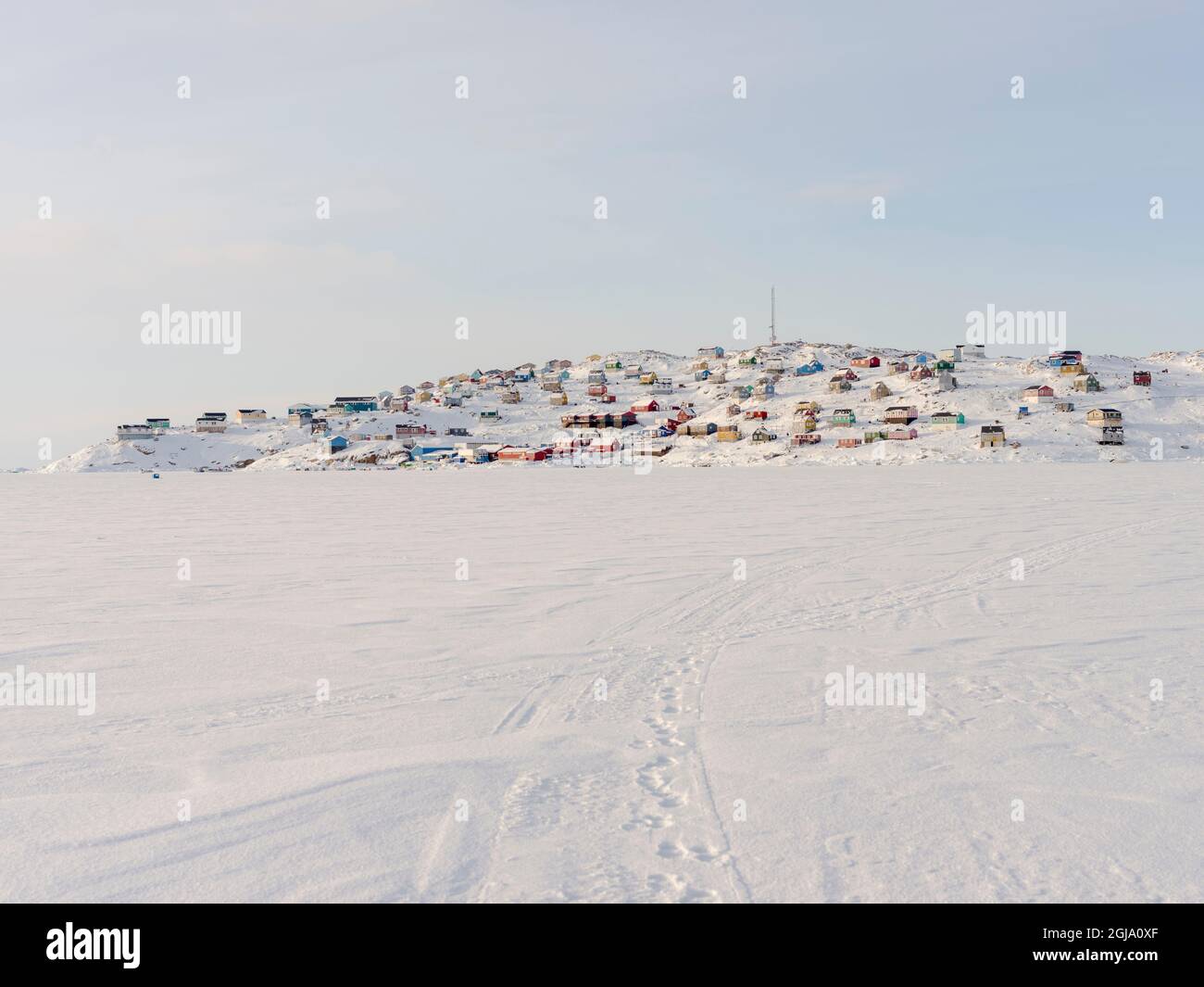 The traditional and remote Greenlandic Inuit village Kullorsuaq located ...