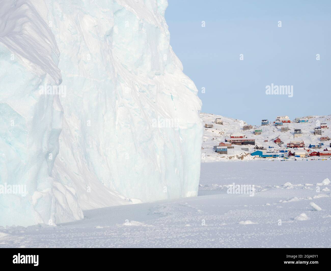 The traditional and remote Greenlandic Inuit village Kullorsuaq located ...