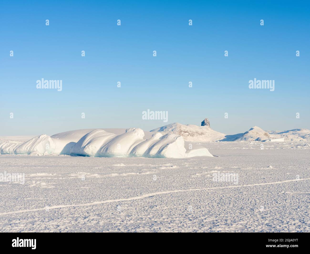 The traditional and remote Greenlandic Inuit village Kullorsuaq located ...
