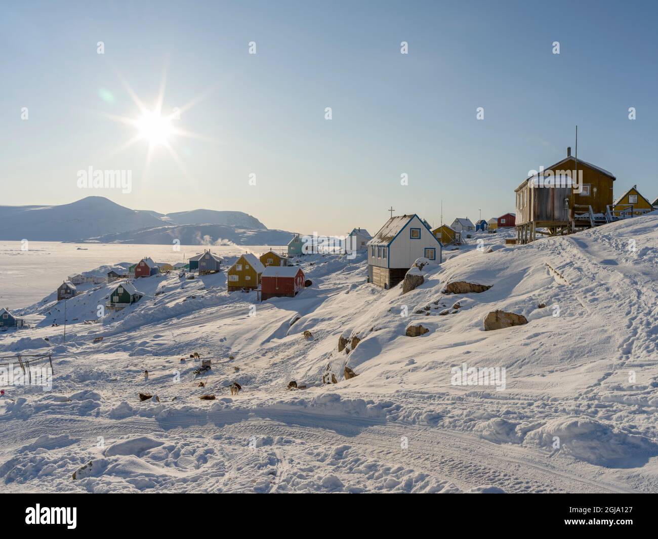 The traditional and remote Greenlandic Inuit village Kullorsuaq located ...