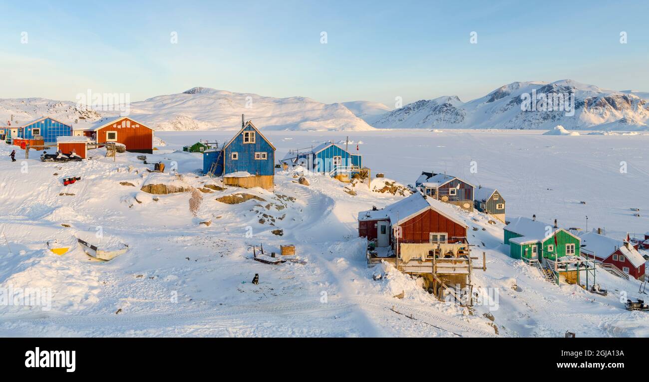 The traditional and remote Greenlandic Inuit village Kullorsuaq located ...