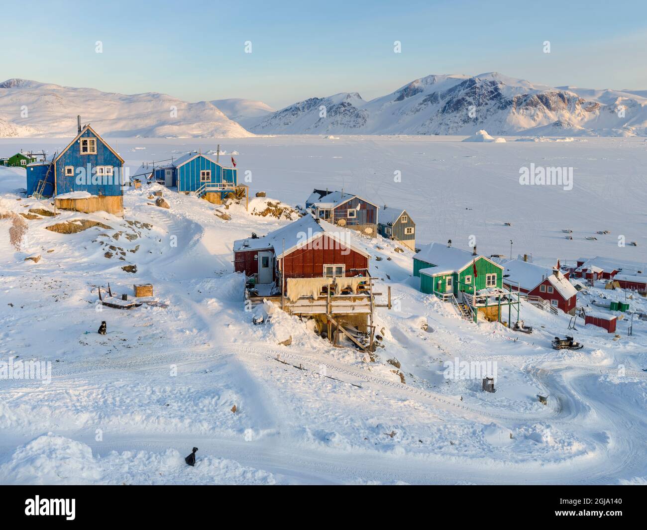 The traditional and remote Greenlandic Inuit village Kullorsuaq located ...