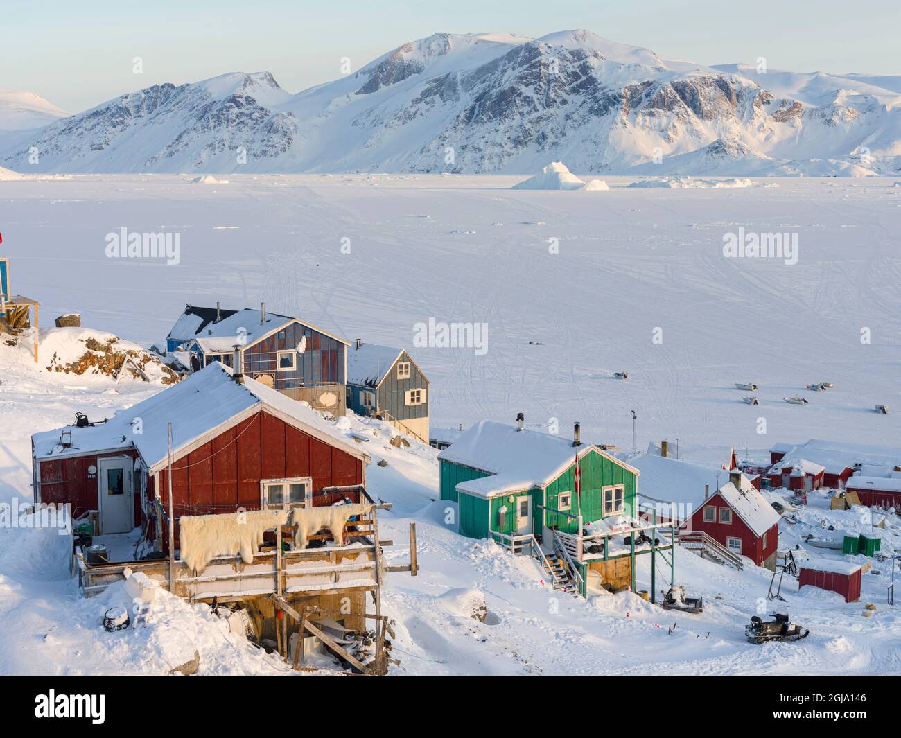 The traditional and remote Greenlandic Inuit village Kullorsuaq located ...