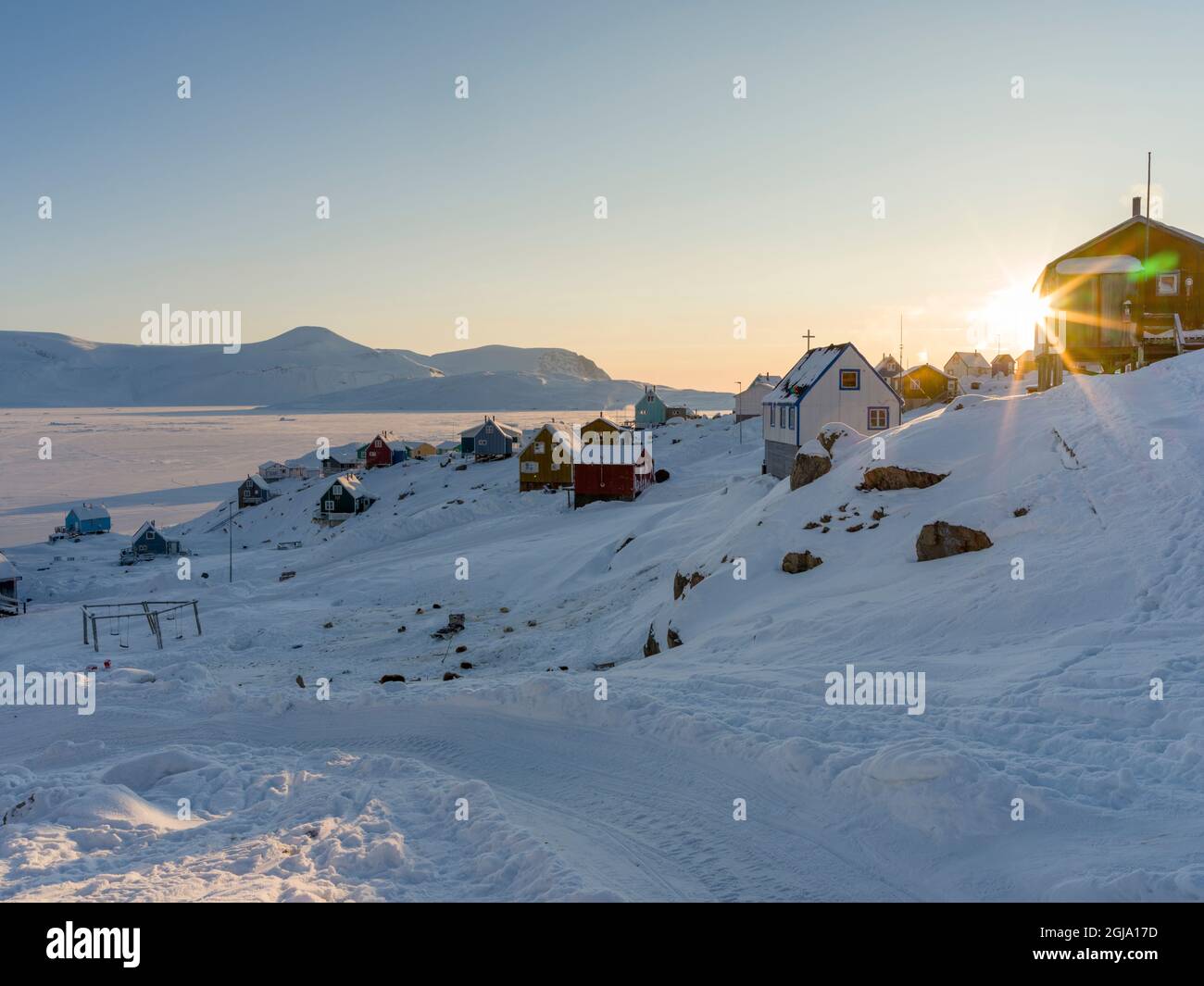 The traditional and remote Greenlandic Inuit village Kullorsuaq located ...