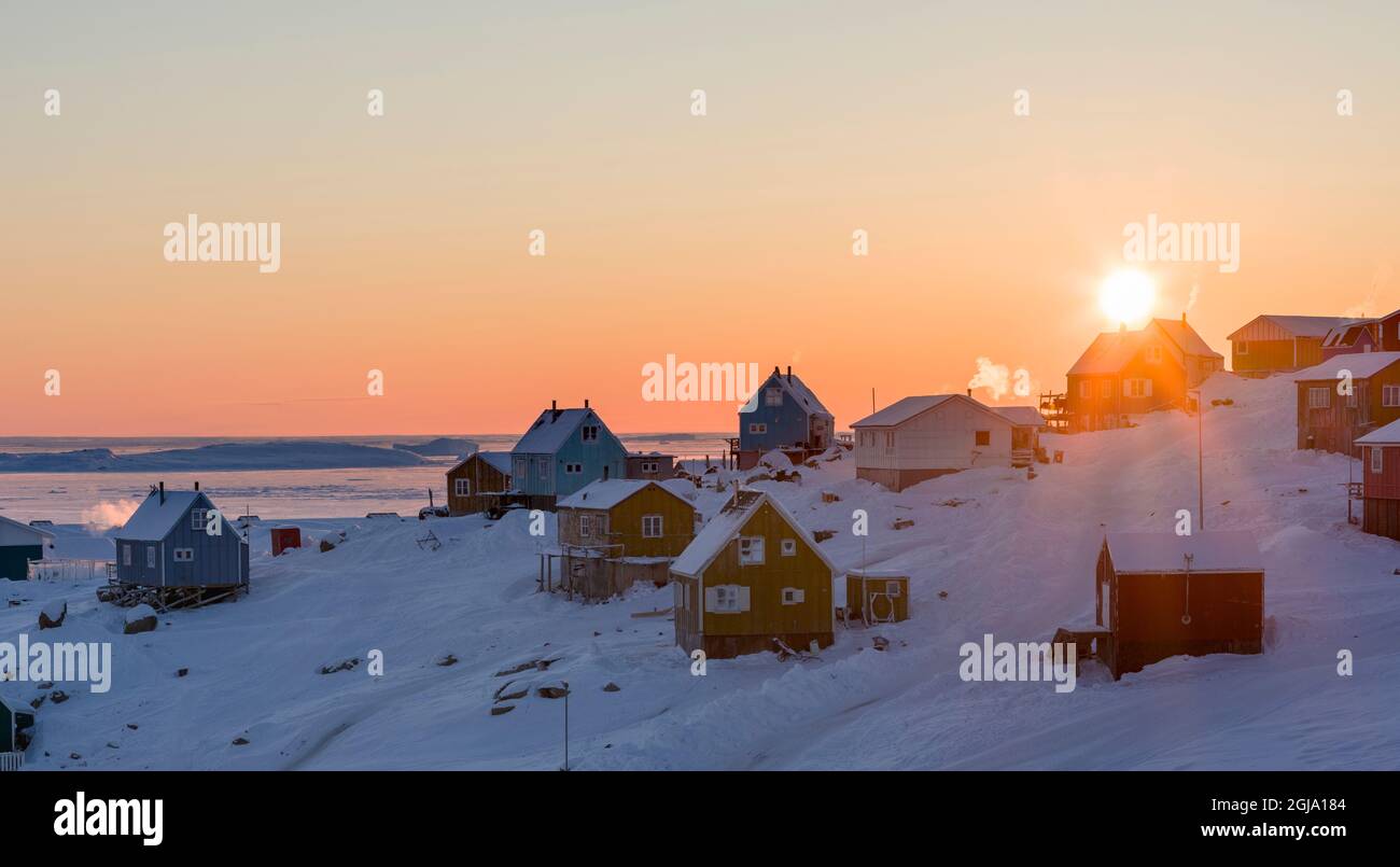 The traditional and remote Greenlandic Inuit village Kullorsuaq located ...