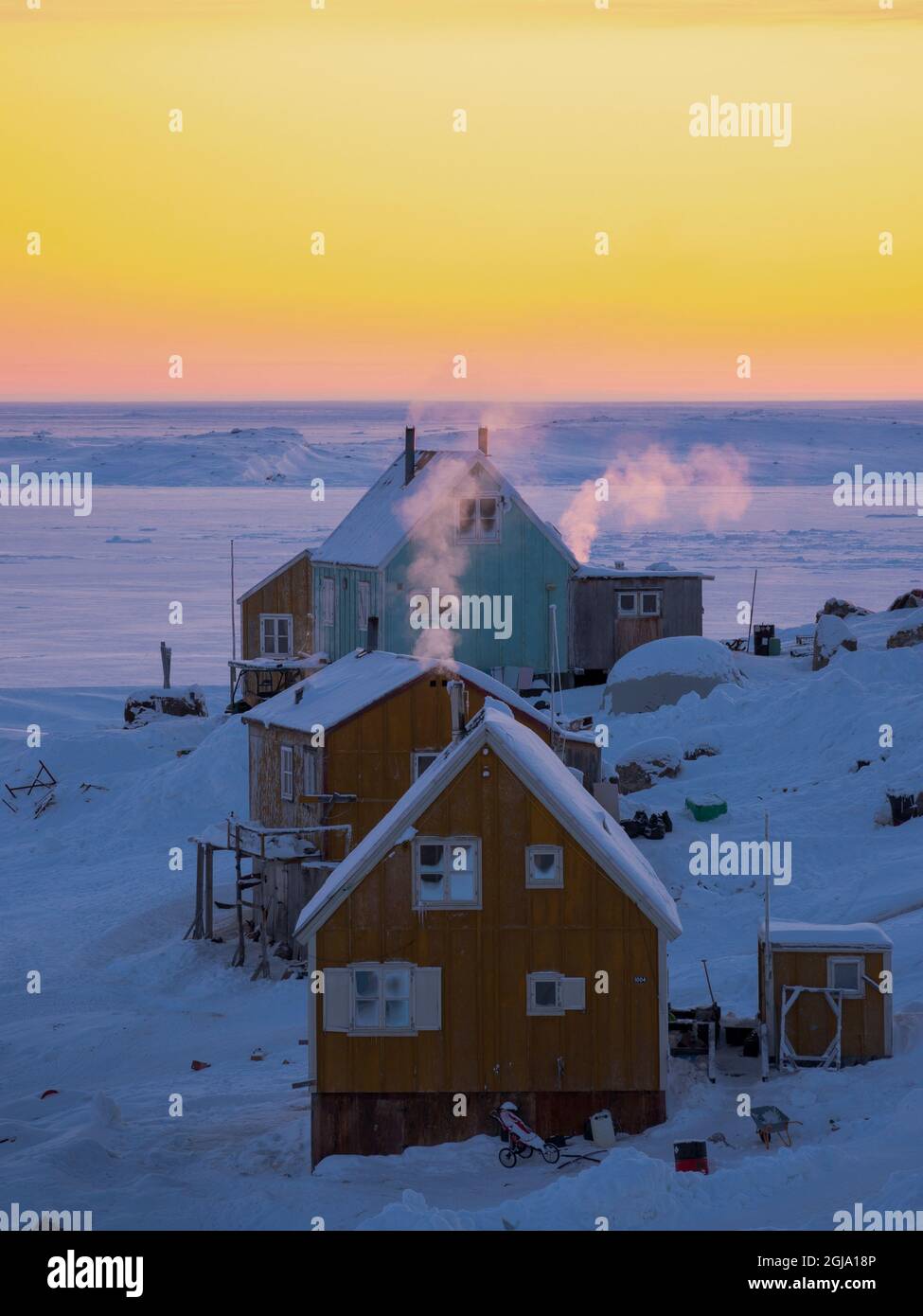 The traditional and remote Greenlandic Inuit village Kullorsuaq located ...