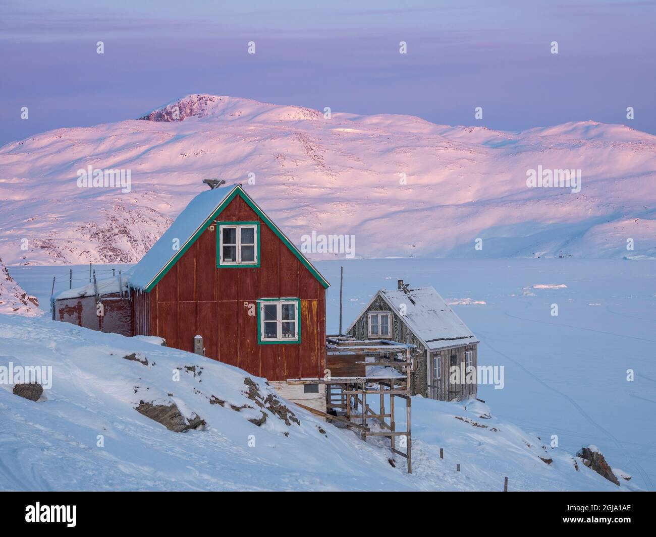 The traditional and remote Greenlandic Inuit village Kullorsuaq located ...