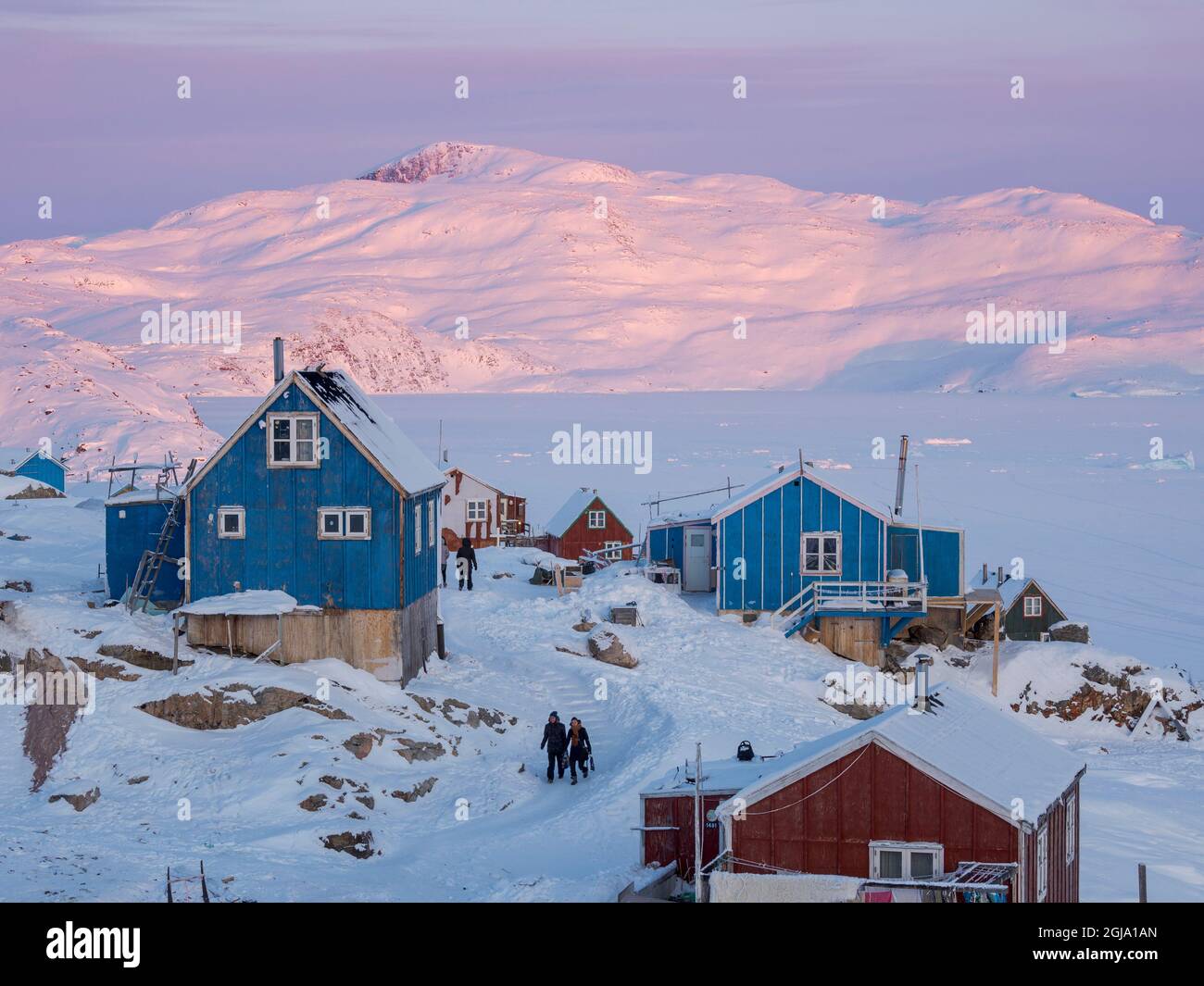 The traditional and remote Greenlandic Inuit village Kullorsuaq located ...