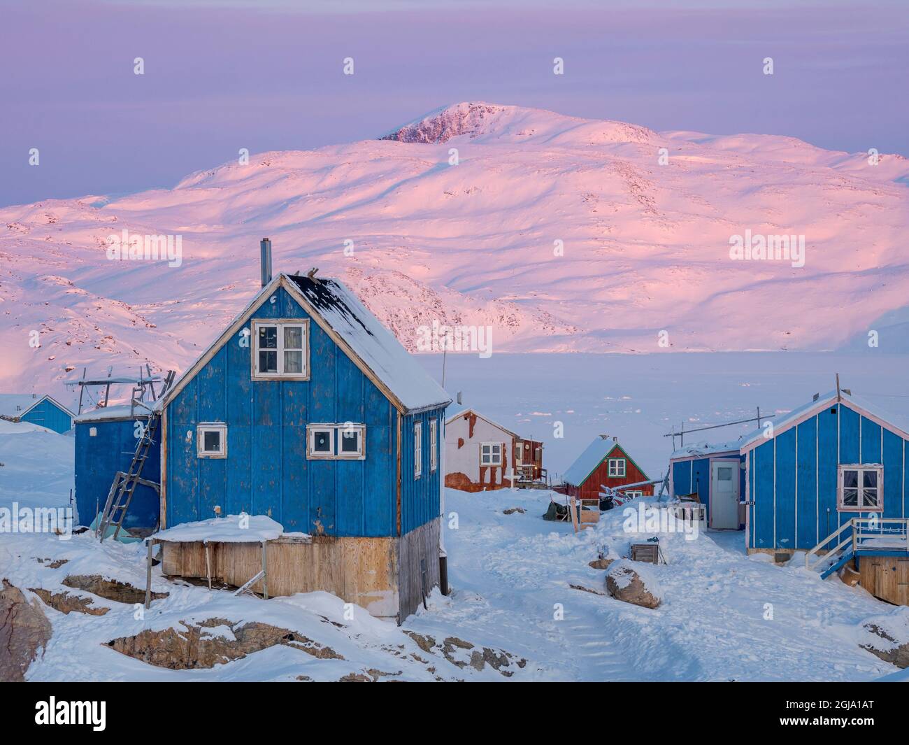 The traditional and remote Greenlandic Inuit village Kullorsuaq located ...