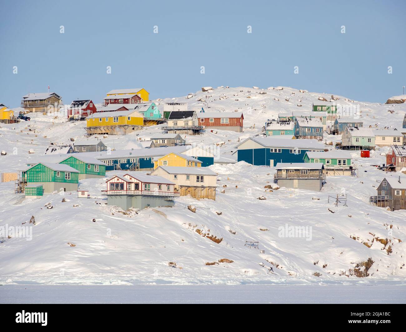 The traditional and remote Greenlandic Inuit village Kullorsuaq located ...