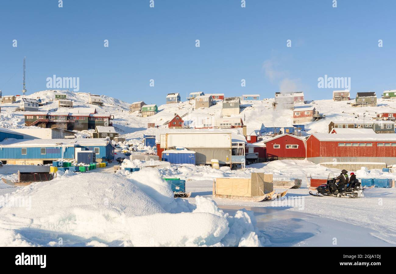 The traditional and remote Greenlandic Inuit village Kullorsuaq located ...