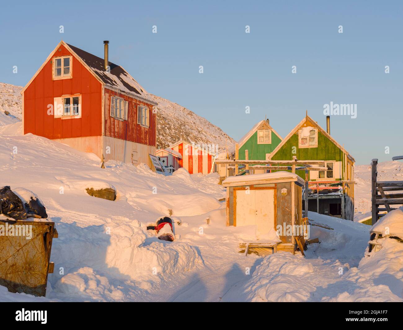 The traditional and remote Greenlandic Inuit village Kullorsuaq located ...