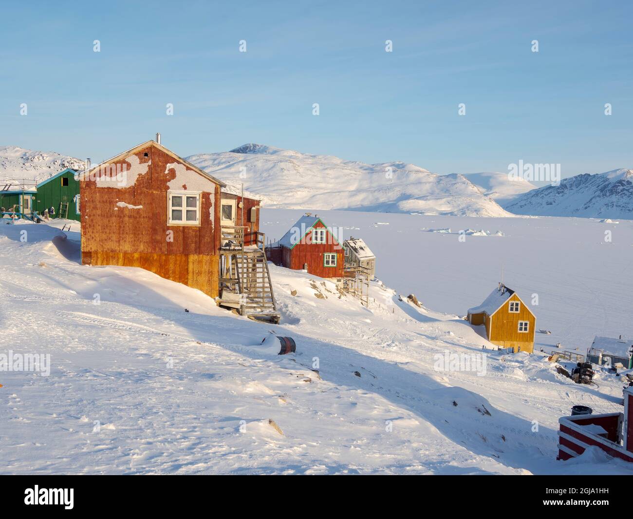 The traditional and remote Greenlandic Inuit village Kullorsuaq located ...