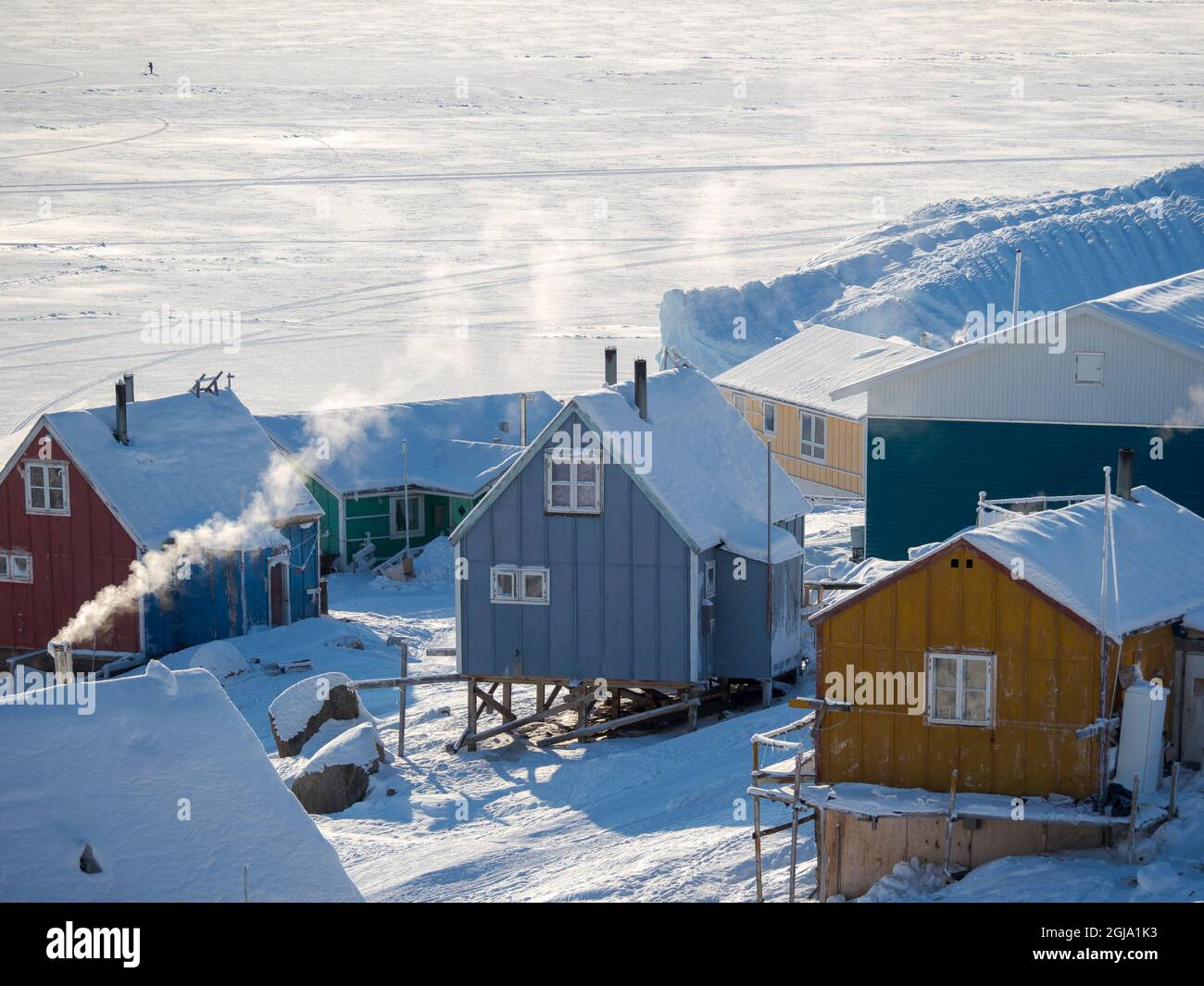 The traditional and remote Greenlandic Inuit village Kullorsuaq located ...
