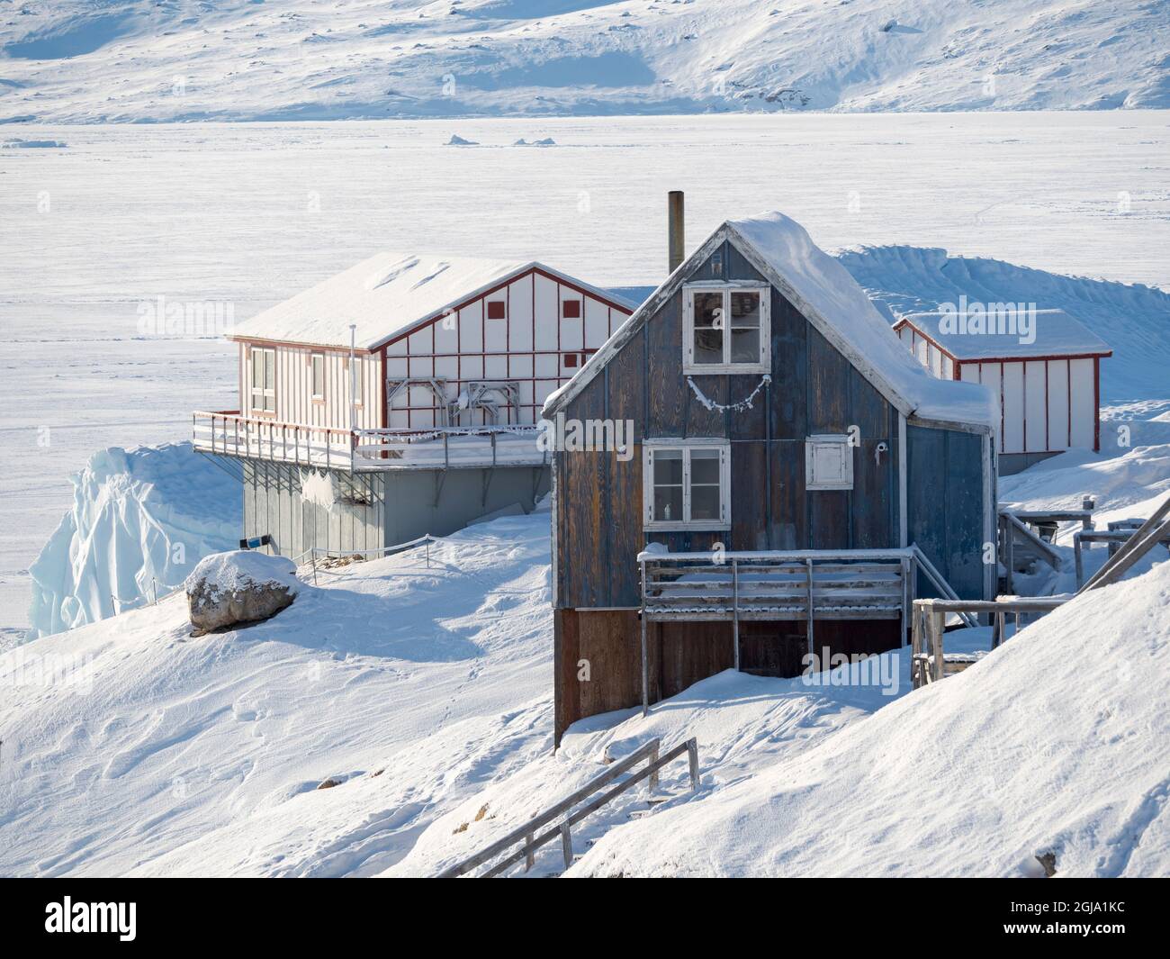 The traditional and remote Greenlandic Inuit village Kullorsuaq located ...