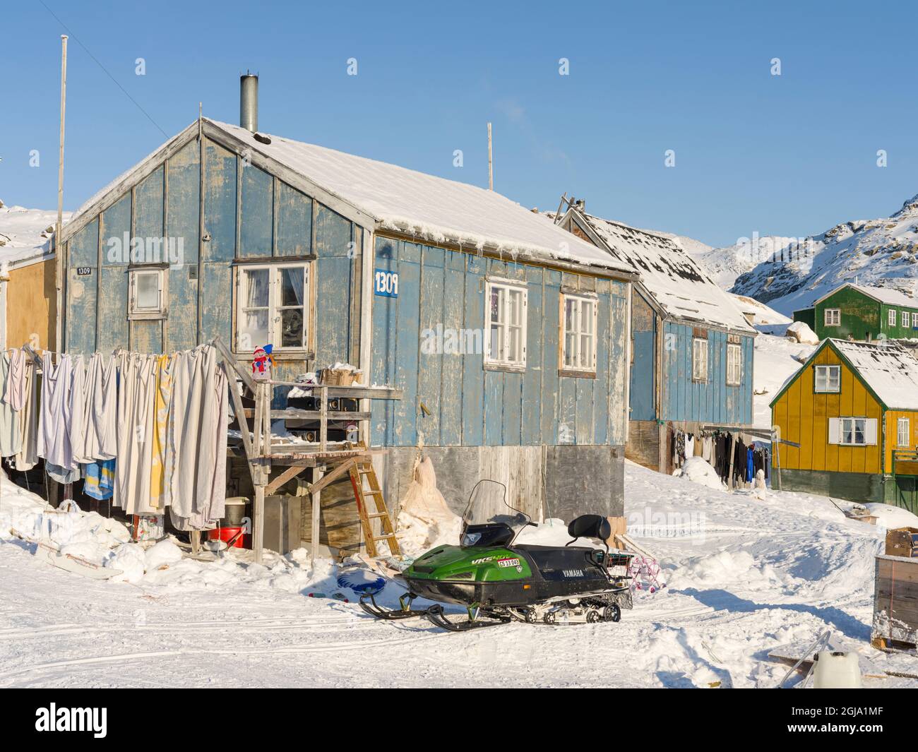 The traditional and remote Greenlandic Inuit village Kullorsuaq located ...