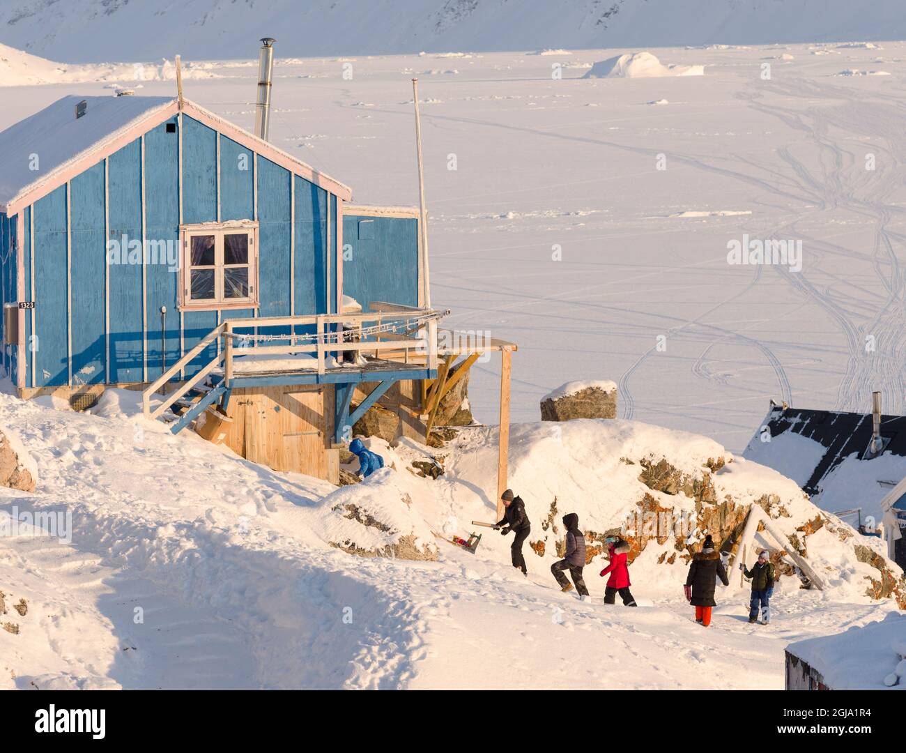 The traditional and remote Greenlandic Inuit village Kullorsuaq located ...