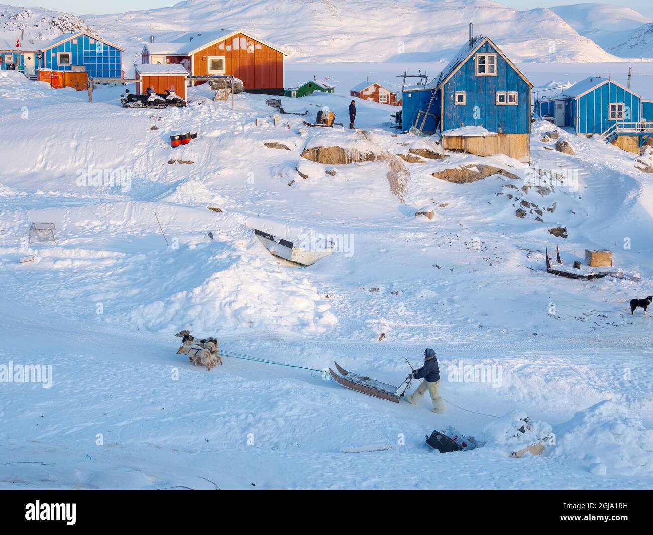 The traditional and remote Greenlandic Inuit village Kullorsuaq located ...