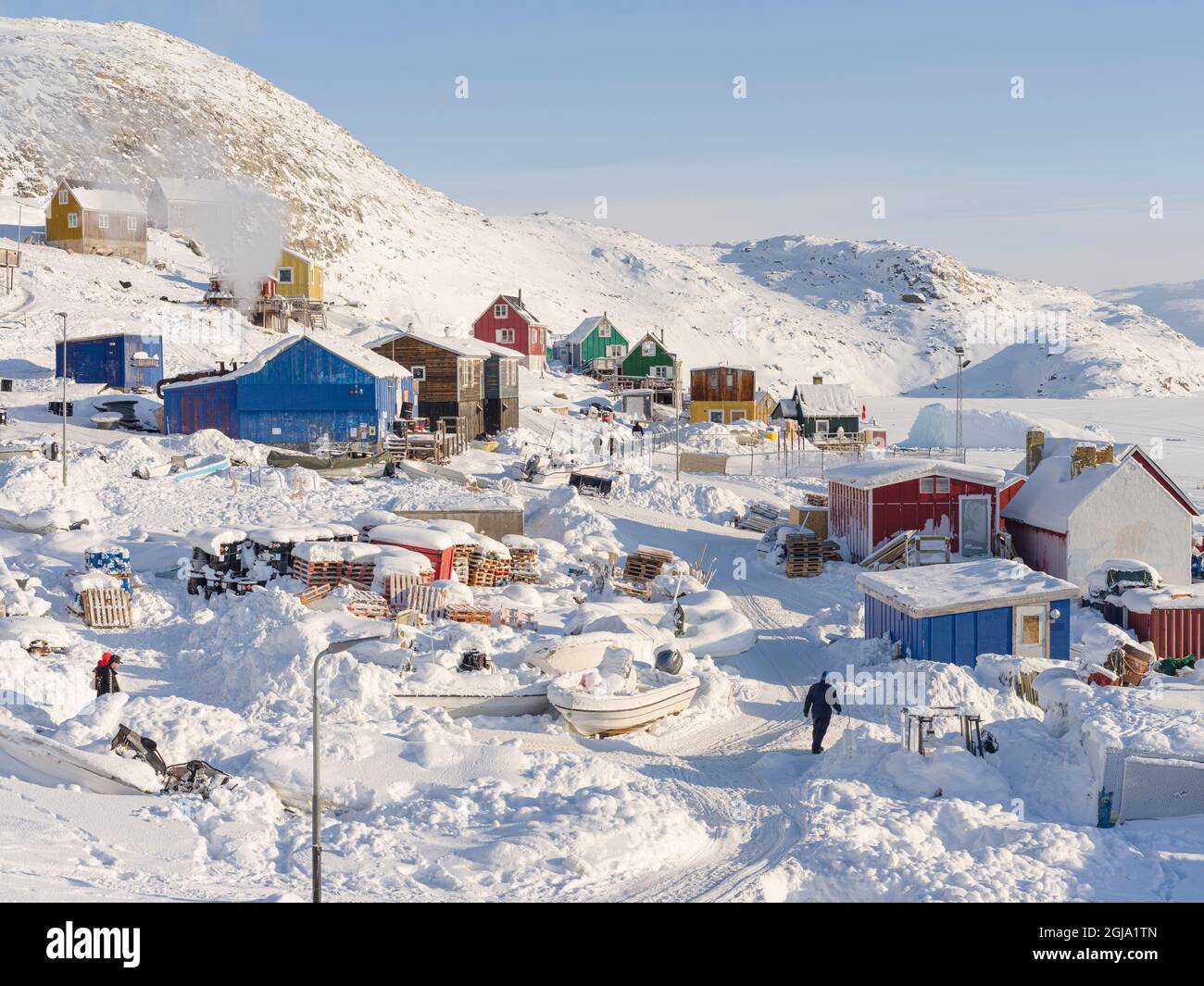 The traditional and remote Greenlandic Inuit village Kullorsuaq located ...