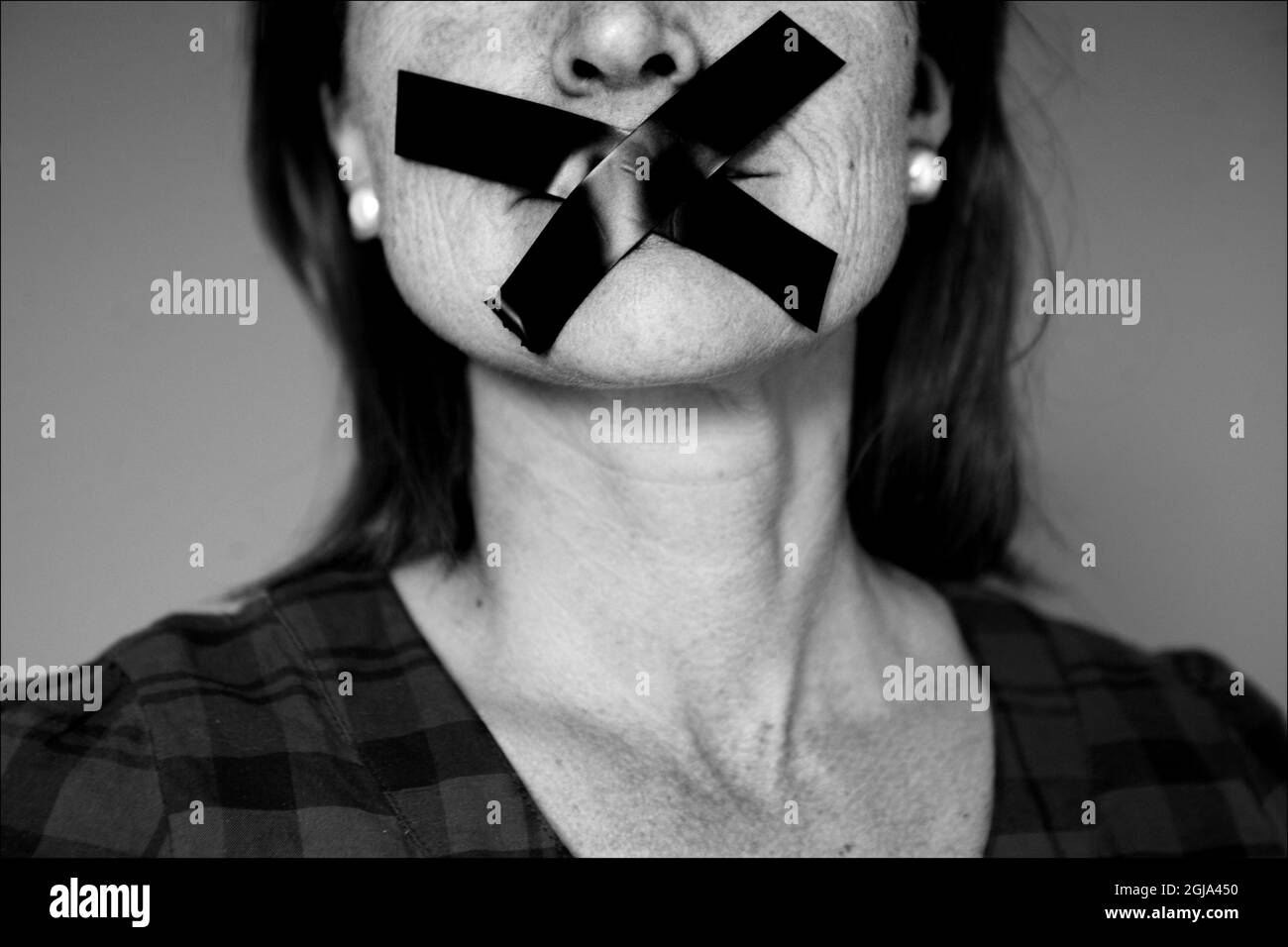 Woman gagged Black and White Stock Photos & Images - Alamy