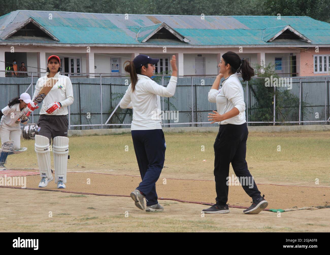 Kashmiri girl cricket players in action at Sports stadium Kunzer in North Kashmir’s Baramulla ...