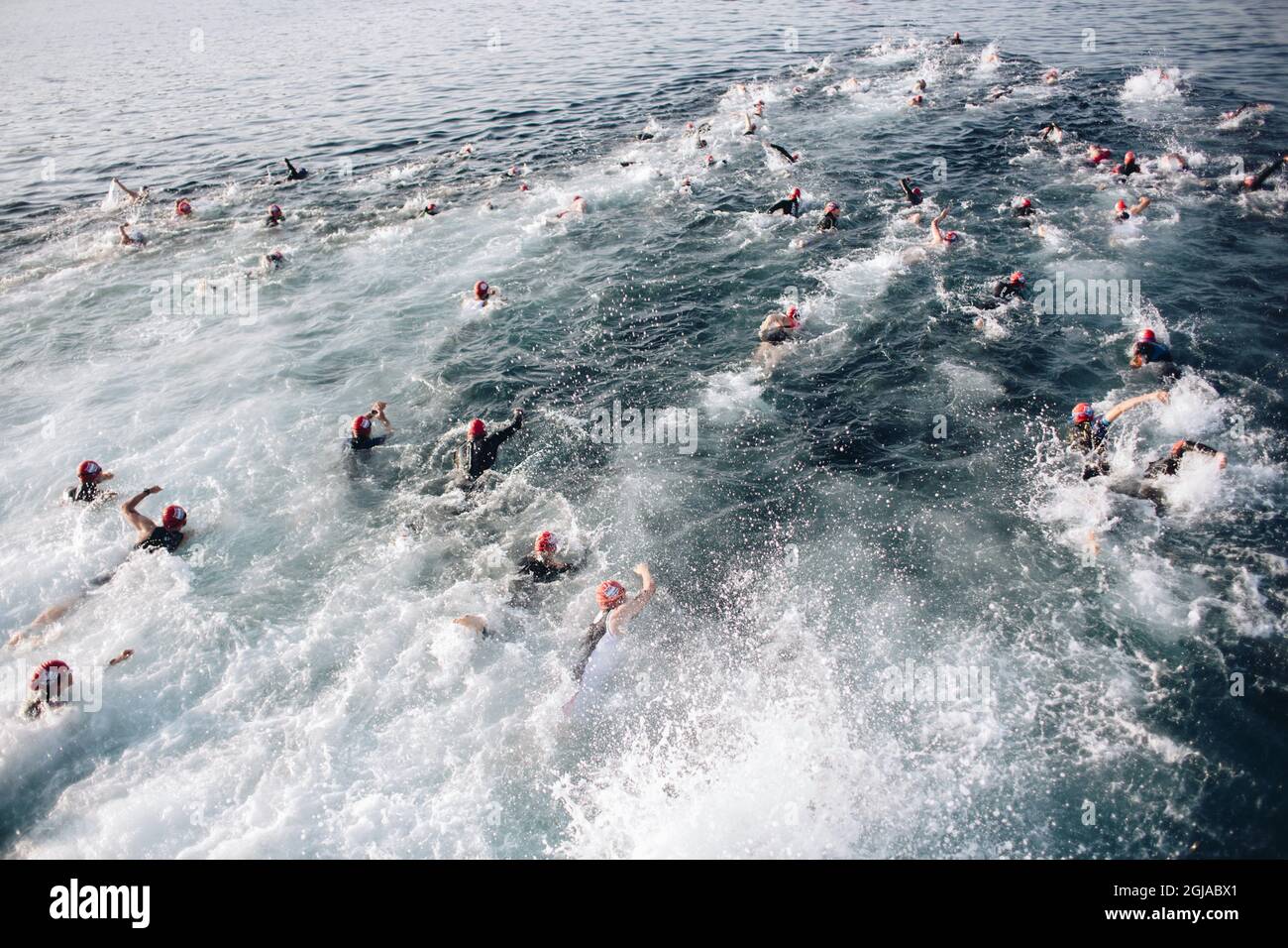 Top view shot of a swimming competition with swimmers in an ocean Stock ...