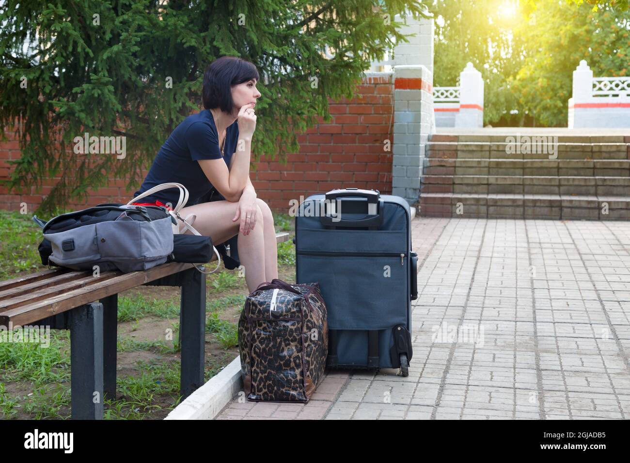 Bored at a bus station hi-res stock photography and images - Alamy