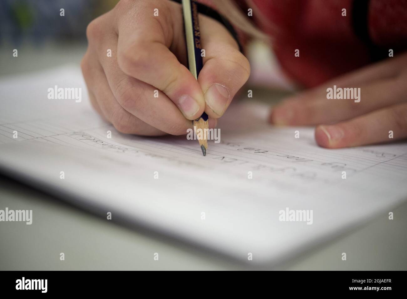 STOCKHOLM 20141217 teaching, education,school, spelling, writing hand ...