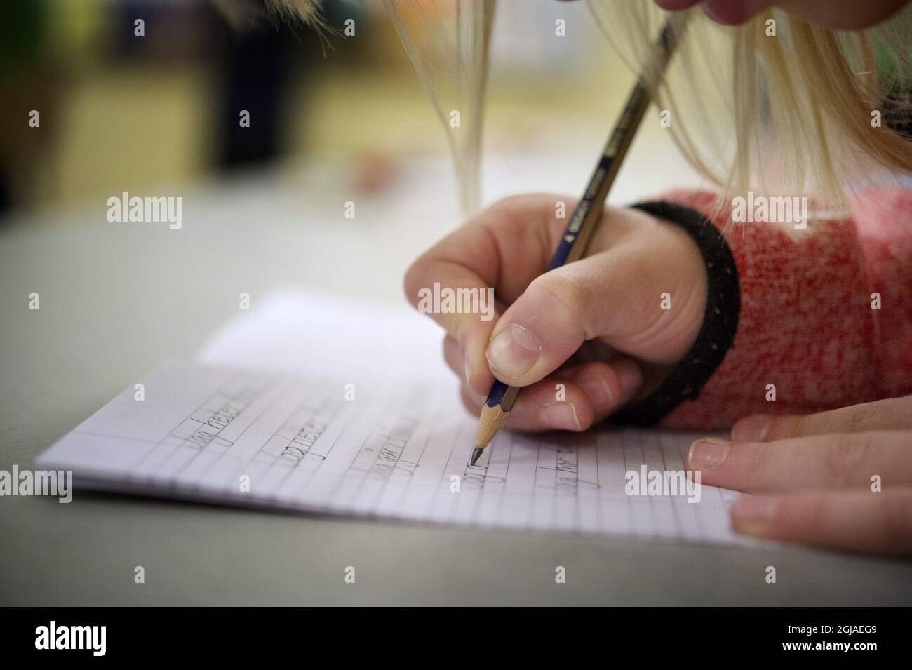 STOCKHOLM 20141217 teaching, education,school, spelling, writing hand ...
