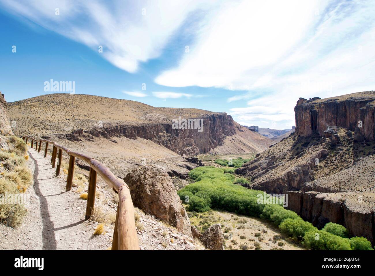 Argentina, Santa Cruz. Pinturas River valley, path that leads to rock ...
