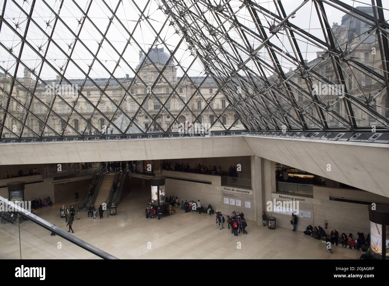 The glass pyramid in the entrance of the Louvre Museum in Paris France ...