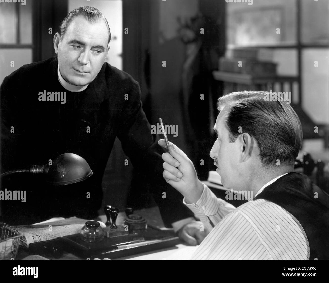 Pat O'Brien, Frank Ferguson, on-set of the Film, "Fighting Father Dunne ...