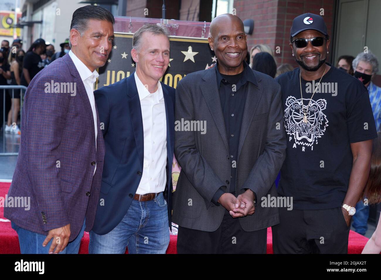Radio personality Kurt Alexander aka Big Boy (second from right) poses ...