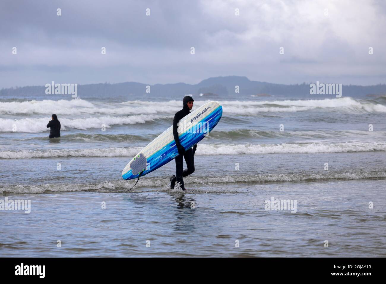 Cold water surfers on Wickaninnish Beach Pacific Rim National Park ...