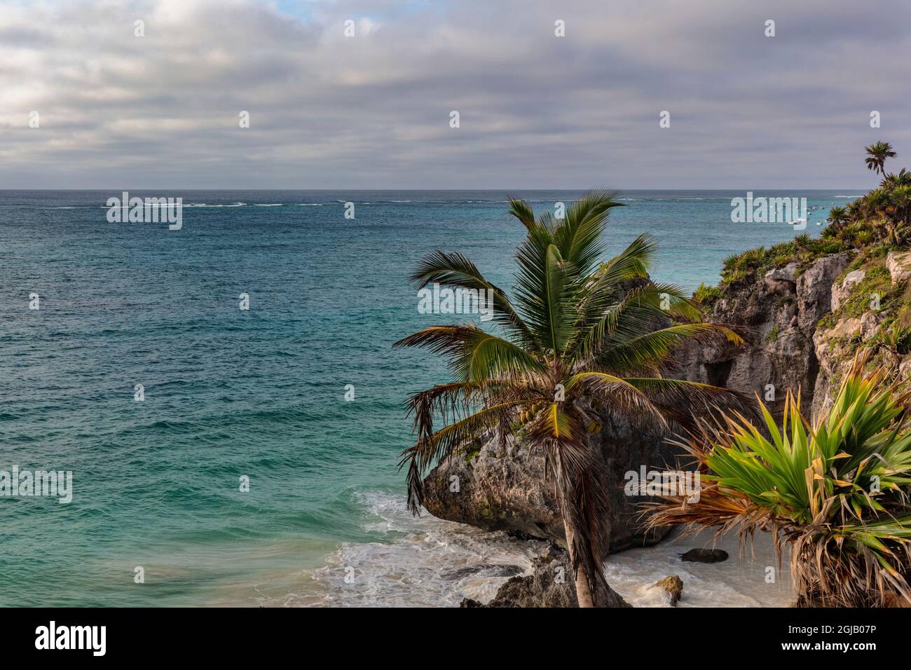 Beach on the Caribbean with fishing boats at the Archeological Zone of ...