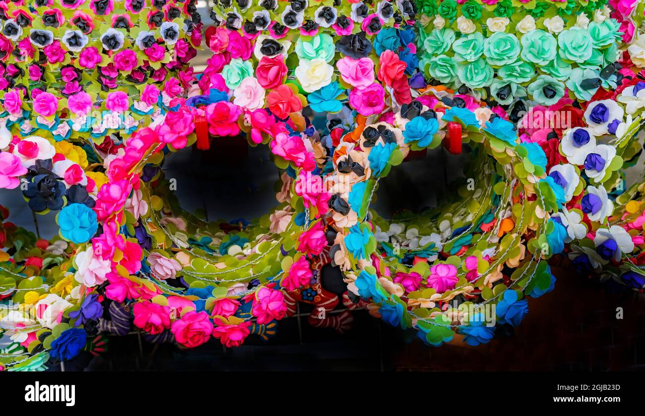 Colorful paper flower wreaths, Oaxaca, Mexico Stock Photo - Alamy
