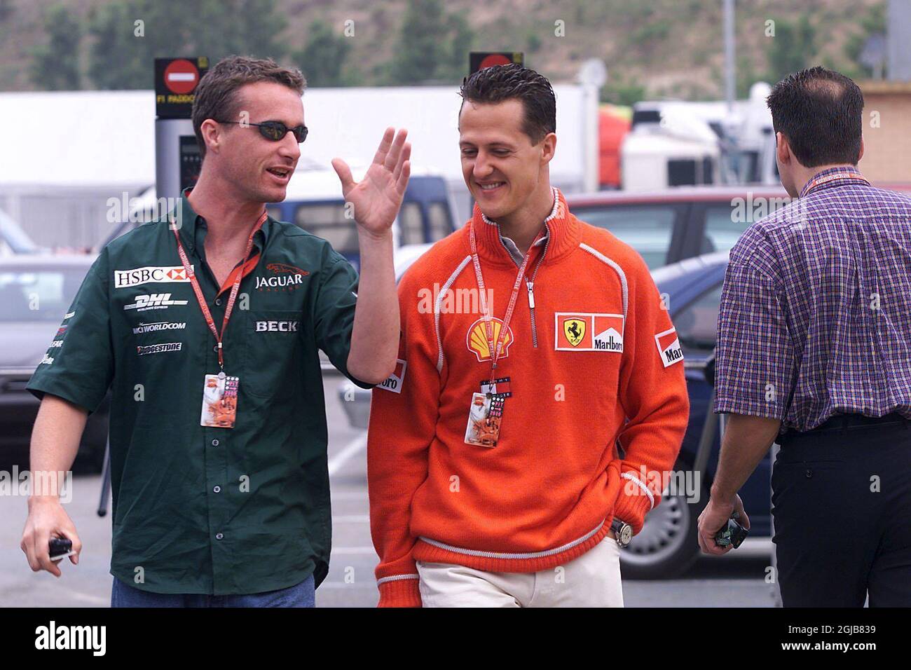 Former teammates Eddie Irvine (l) and Michael Schumacher (r) chatting ...