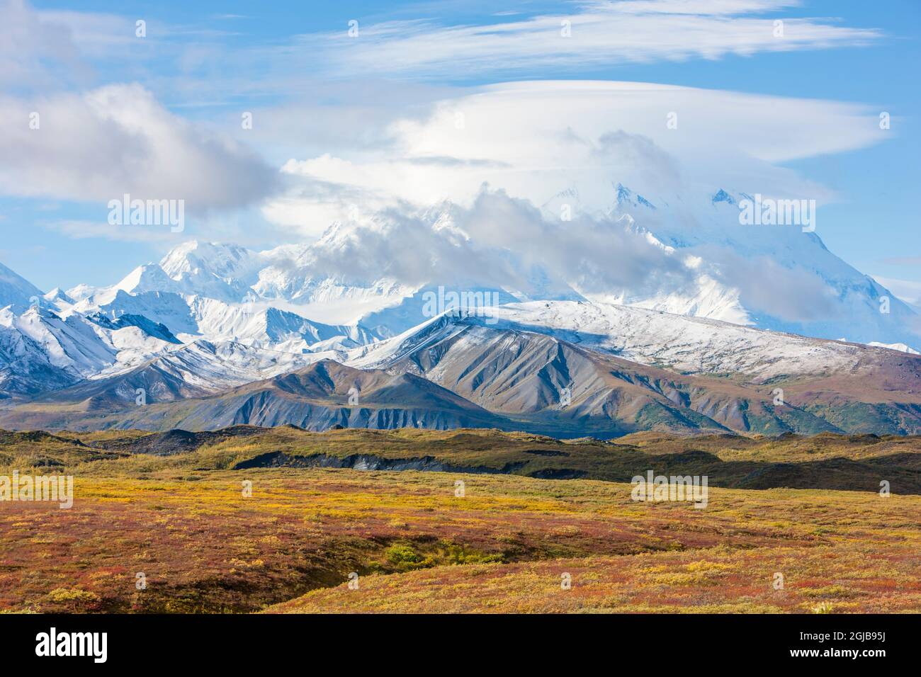 USA, Alaska. Fall colors in Denali National Park with a lenticular ...