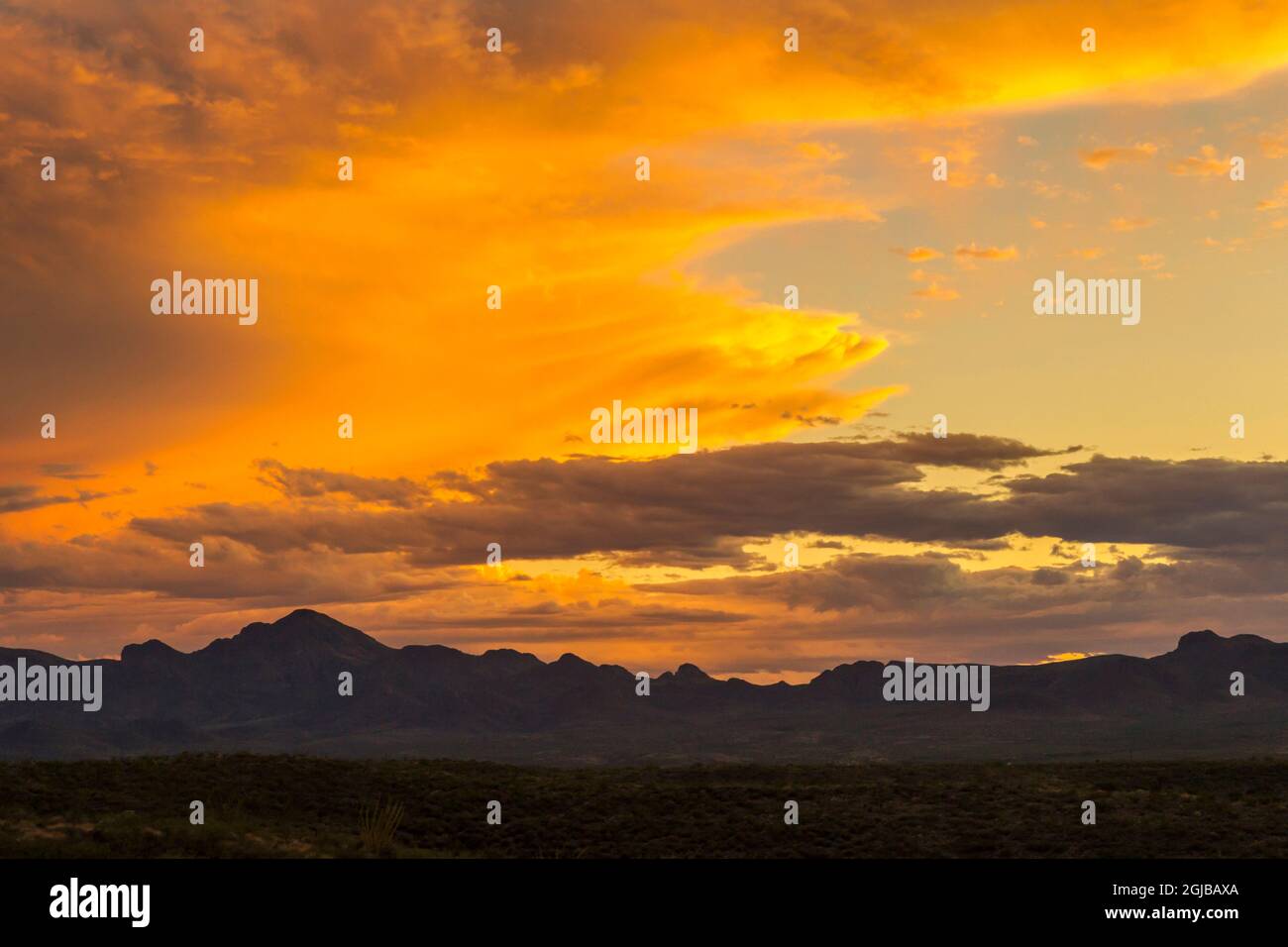 USA, Arizona, Santa Cruz County. Santa Rita Mountains silhouette at ...