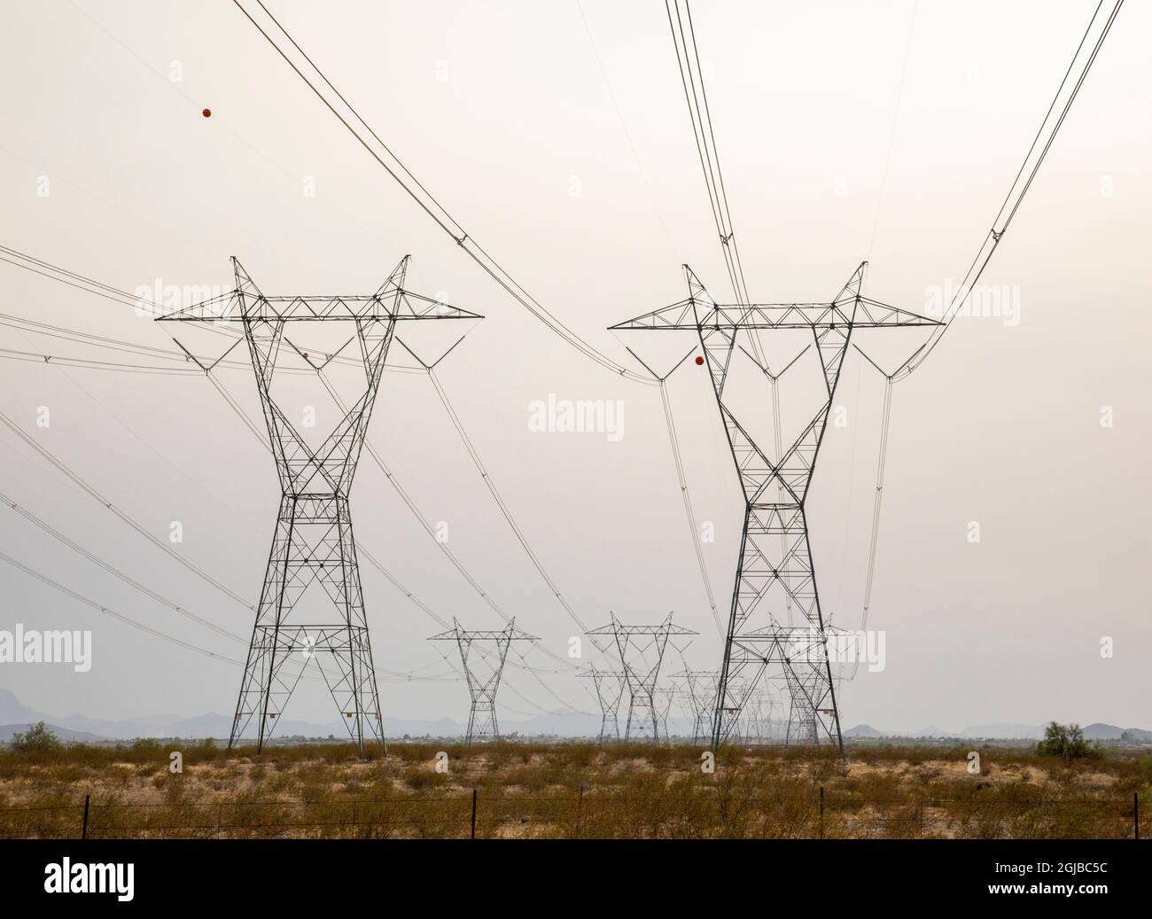 USA, Arizona. Converging transmission towers and power lines Stock ...