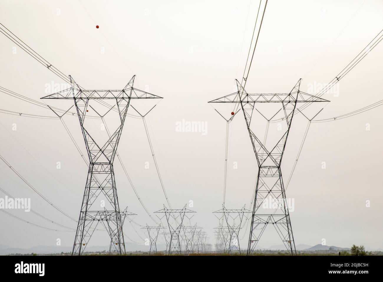 USA, Arizona. Converging transmission towers and power lines Stock ...